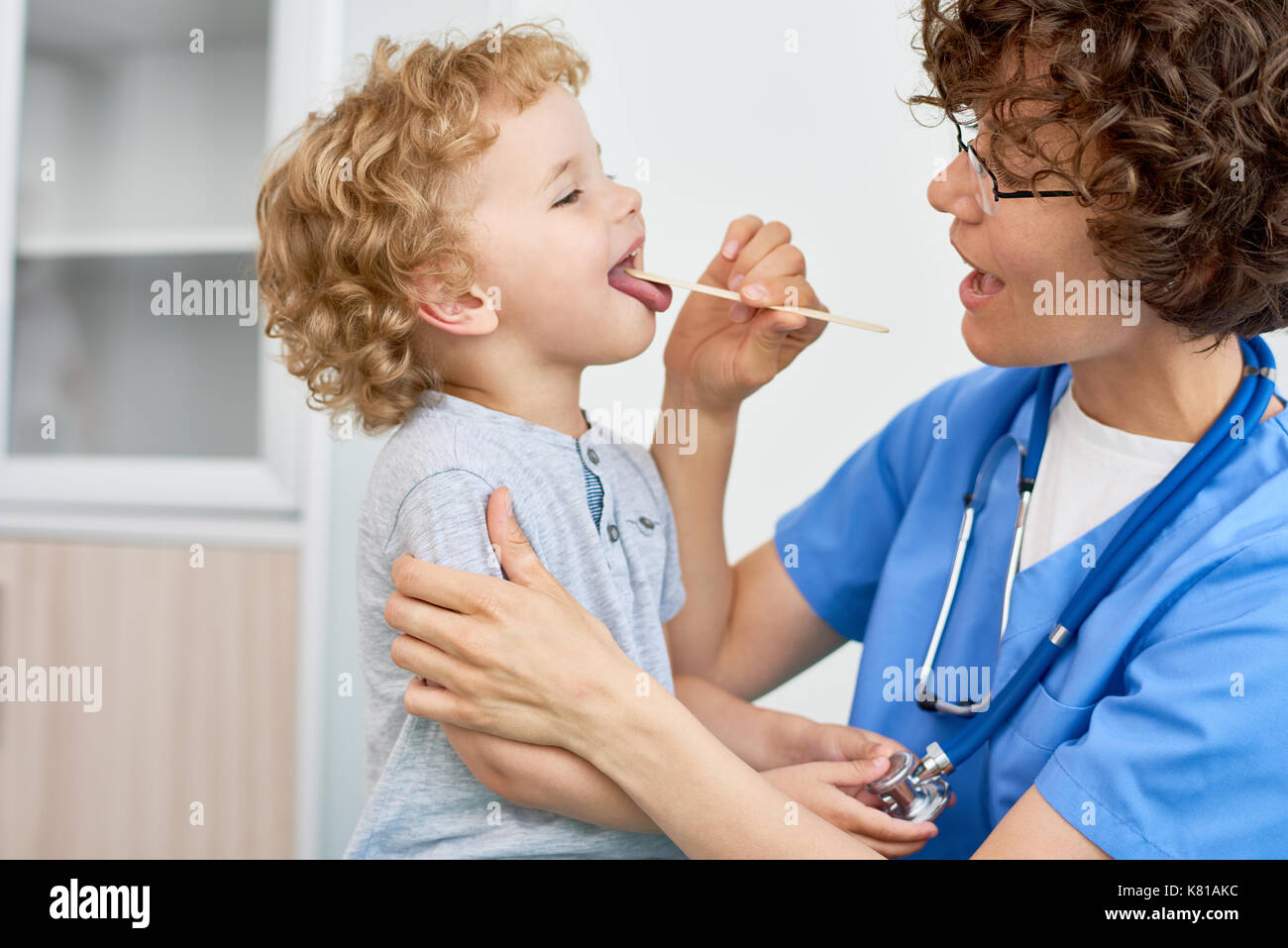 Child check up illness hi-res stock photography and images - Alamy