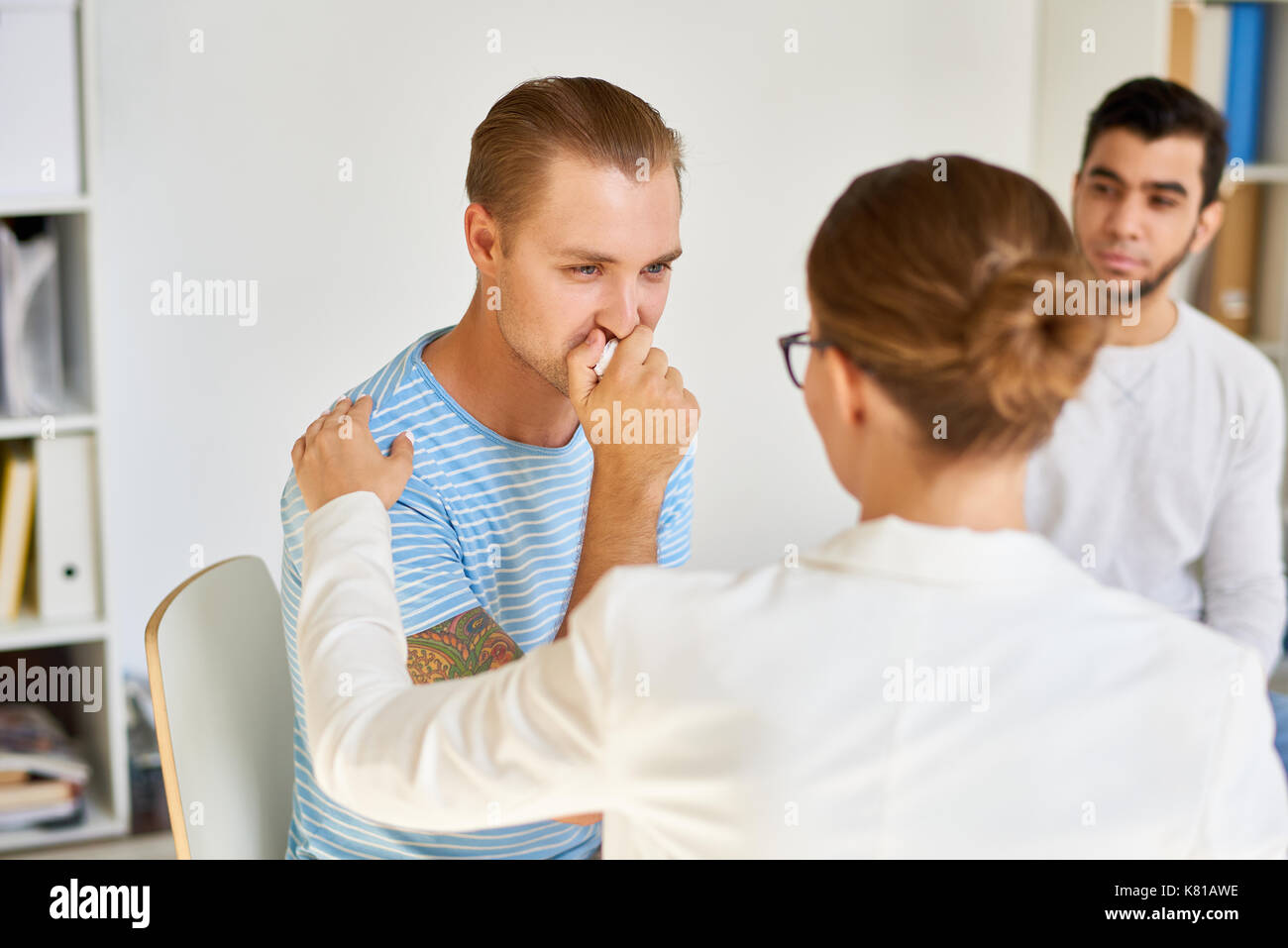 Supporting Patient at Group Therapy Session Stock Photo - Alamy