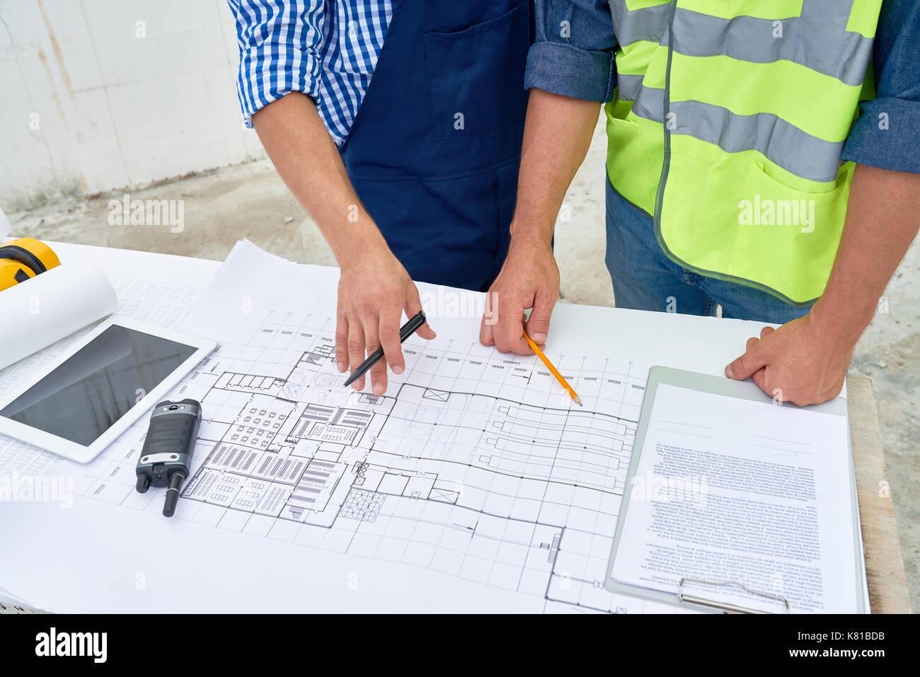 Working Meeting at Construction Site Stock Photo - Alamy