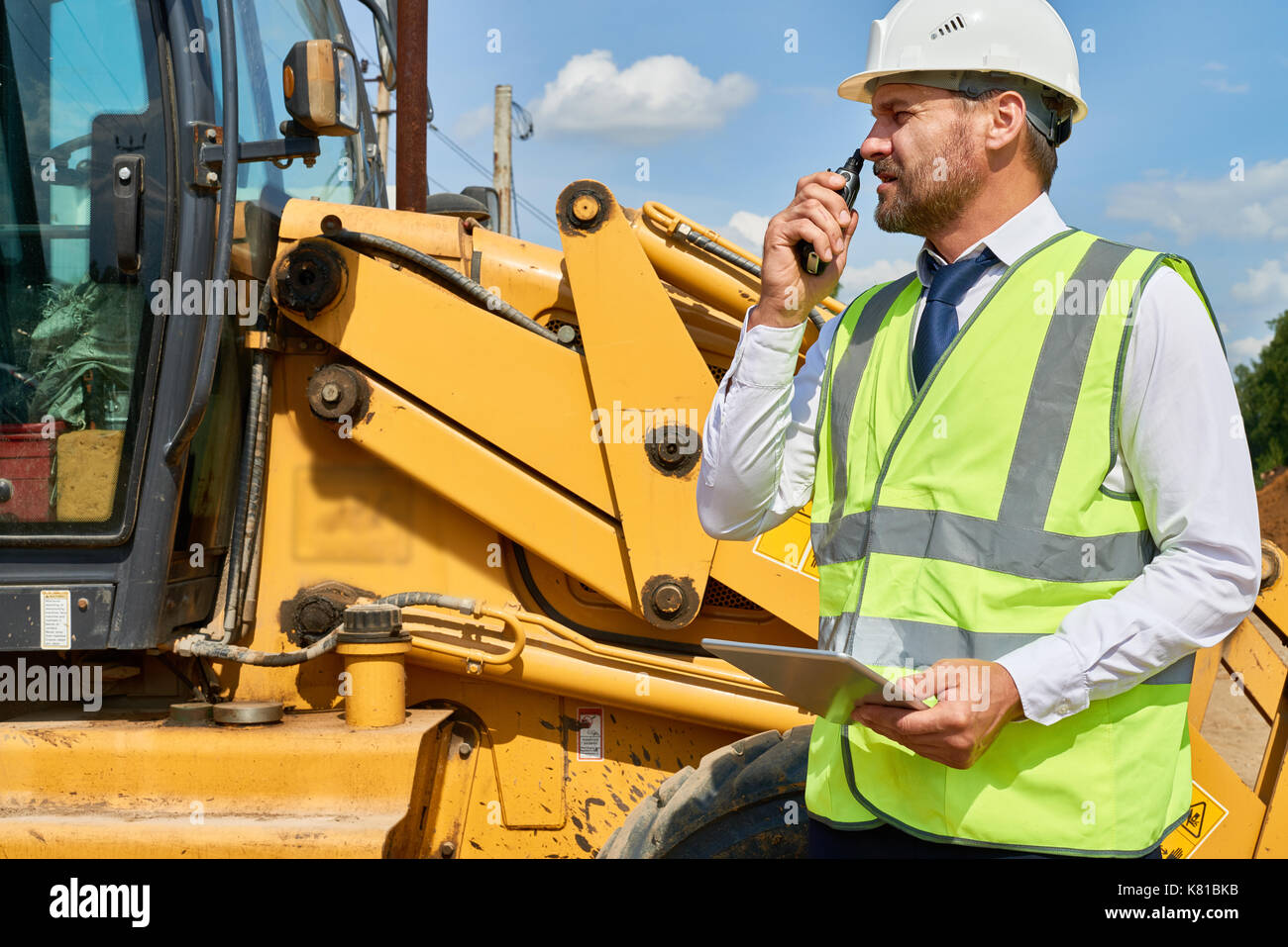 Busy construction engineer talking hi-res stock photography and images ...