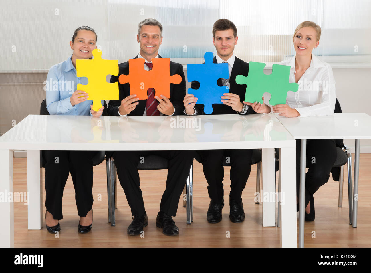 Team work puzzles hi-res stock photography and images - Alamy