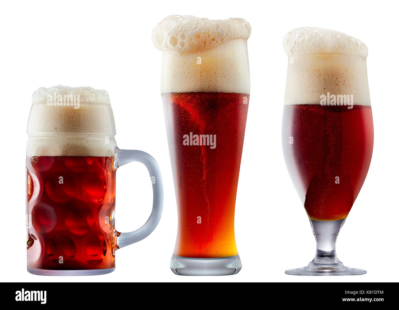 Mug of frosty dark red beer with foam Stock Photo - Alamy