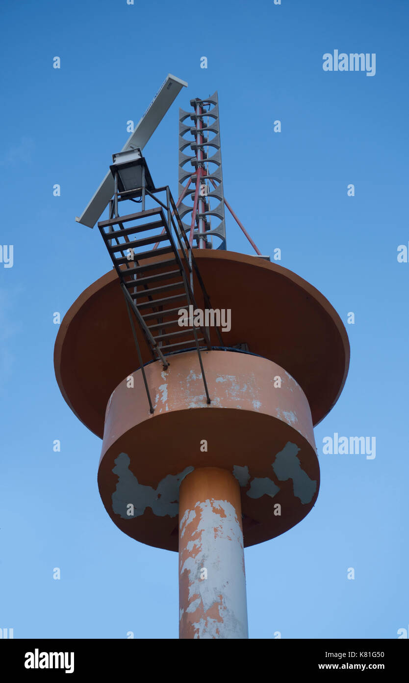 Bottom view of meteorological tower station over blue sky background ...