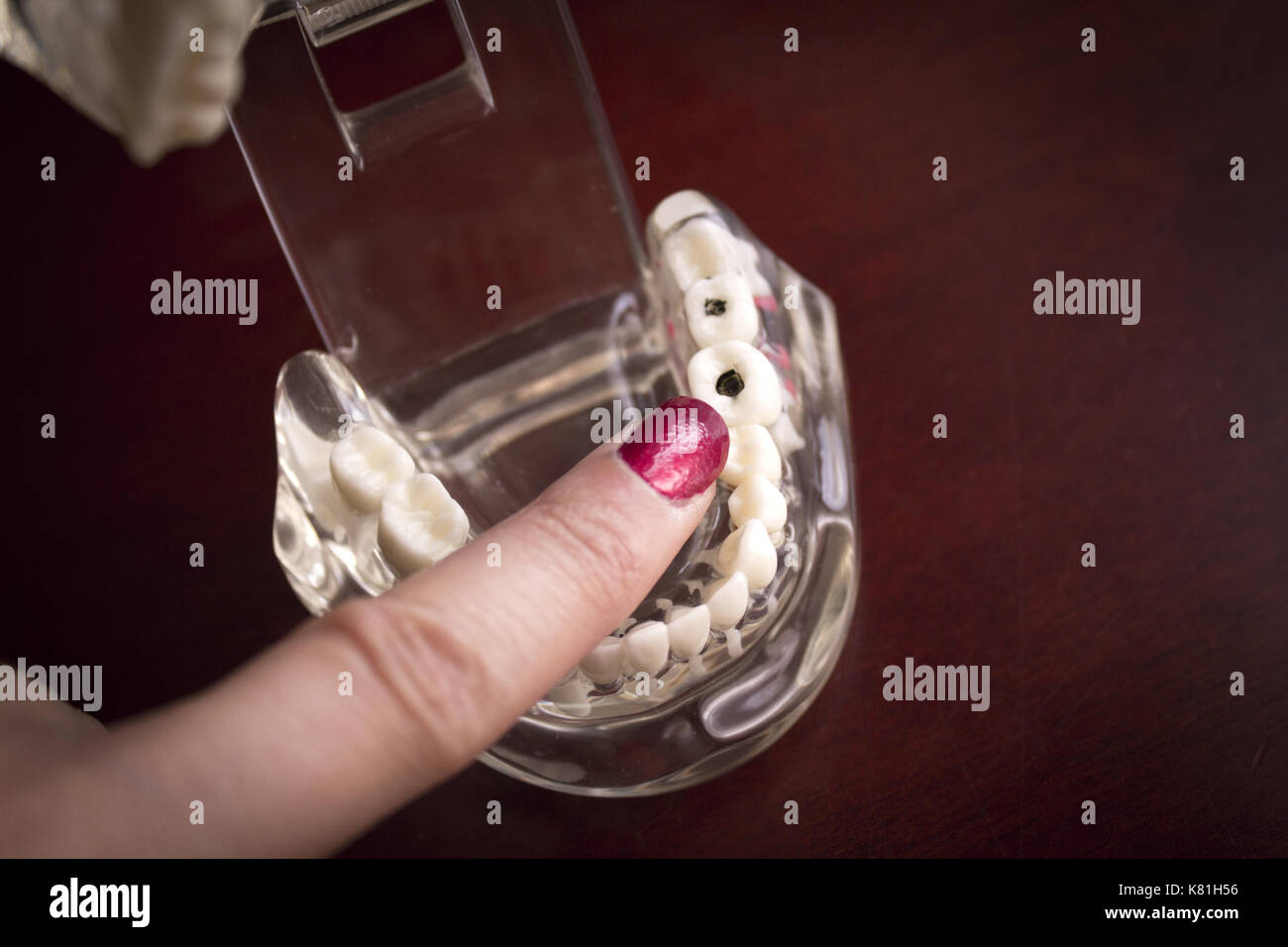 Woman finger point teeth hi-res stock photography and images - Alamy