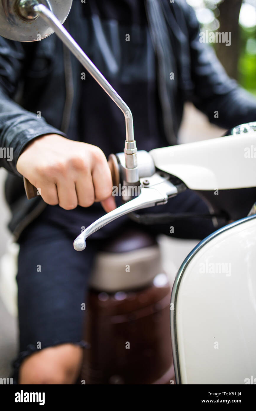 Riding motorcycle, close up of hand on handlebar Stock Photo - Alamy