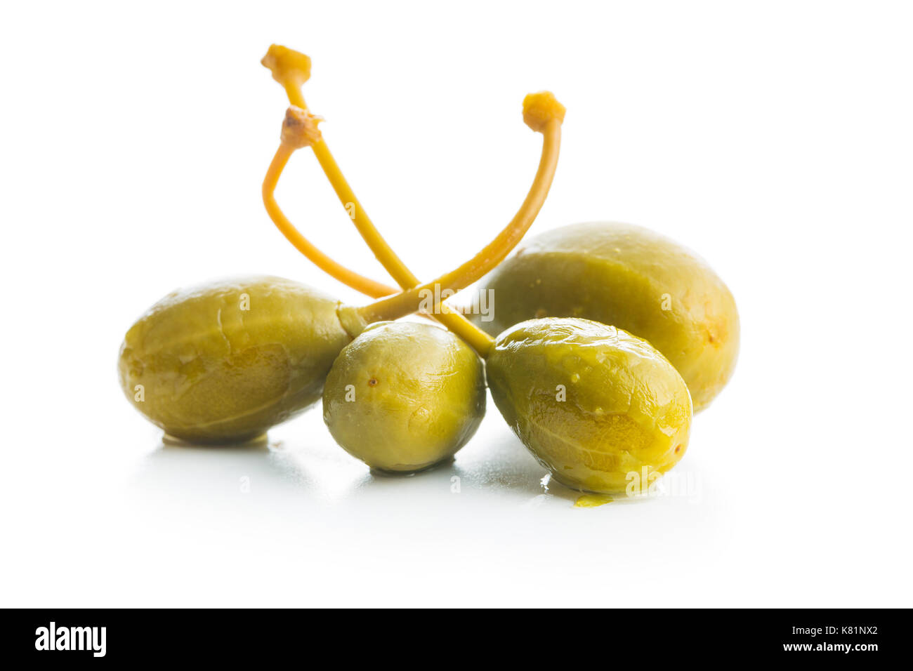 Pickled caper berries isolated on white background Stock Photo - Alamy