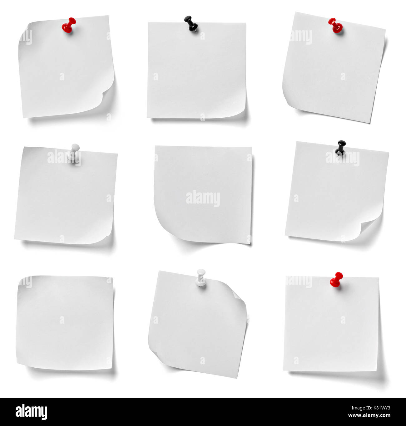 collection of various note paper with a red push pin on white ...