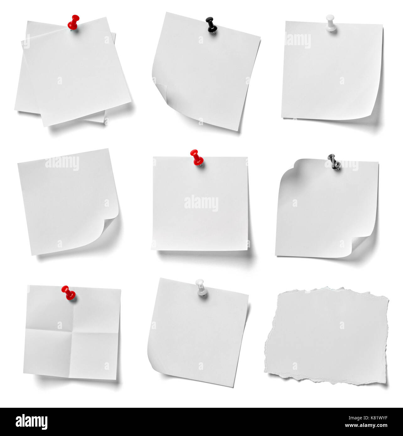 collection of various note paper with a red push pin on white ...