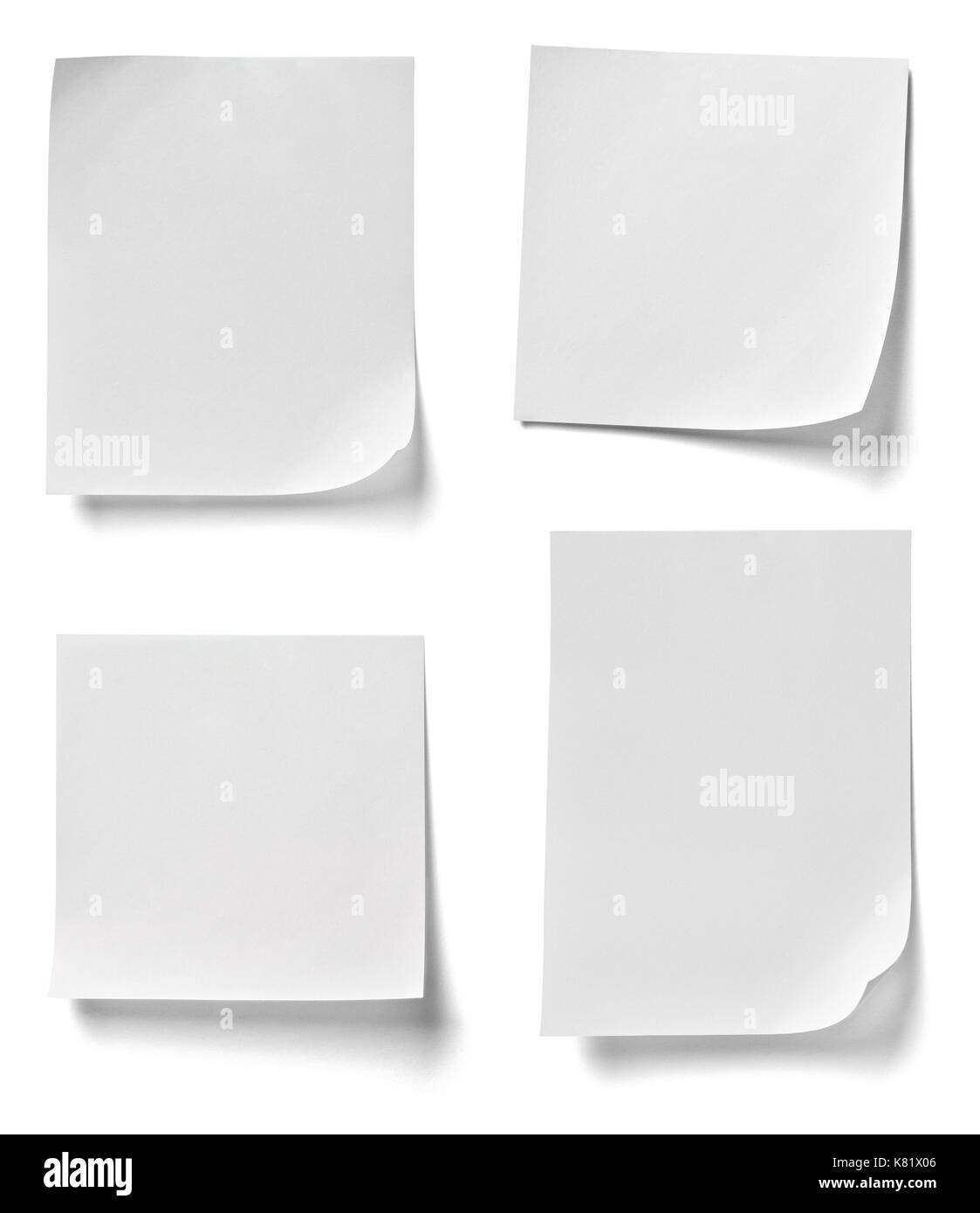 collection of various note papers on white background. each one is shot ...