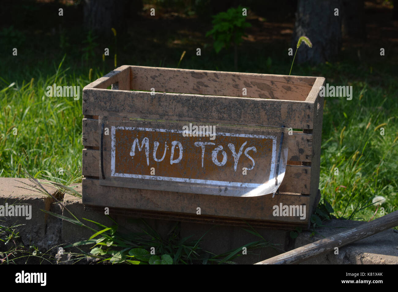 Box for muddy toys Stock Photo - Alamy