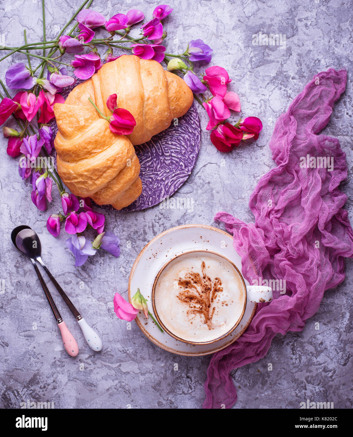 Coffee, croissants and flower Stock Photo - Alamy