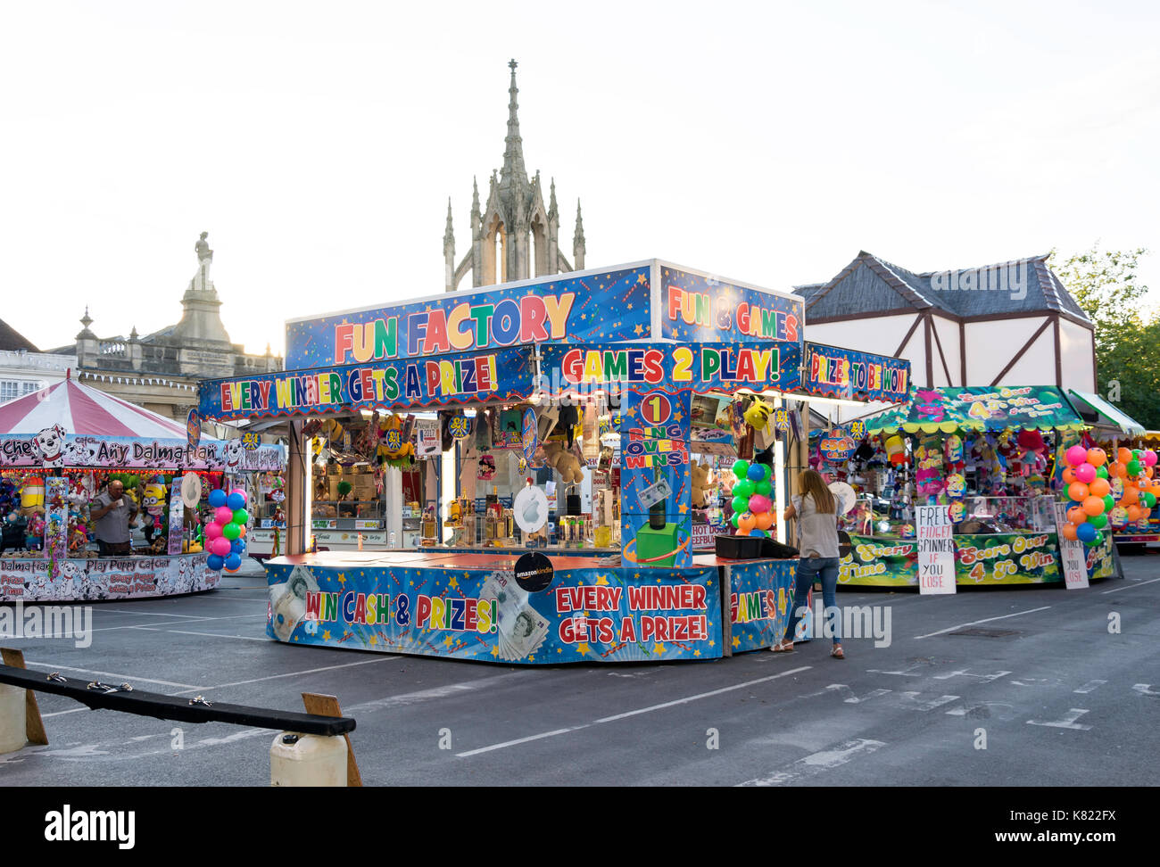 Funfair at dusk in The Market Place, Devizes, Wiltshire, England ...