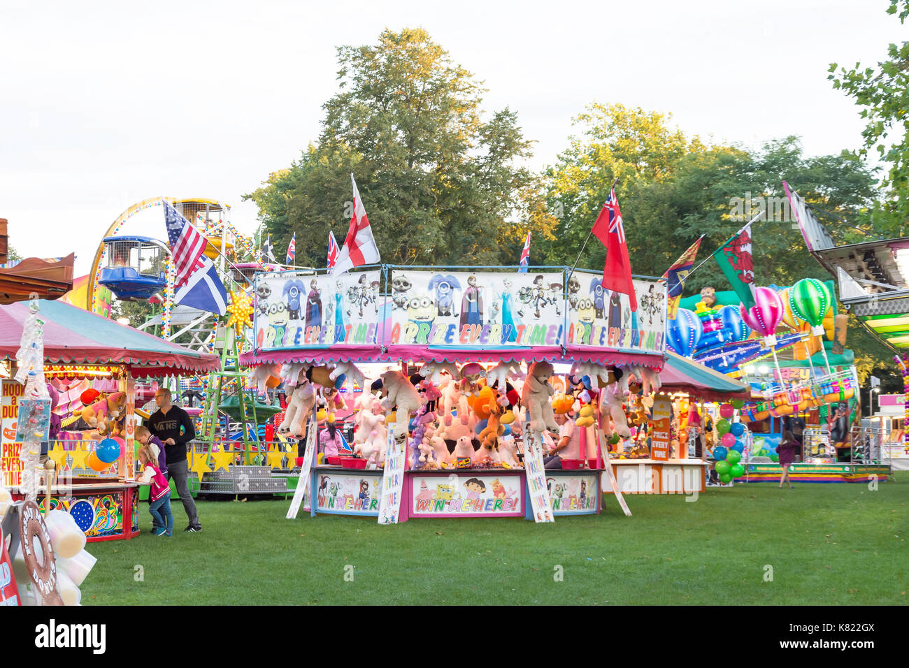 Prize stalls and rides at funfair on Large Green, Nursteed Road ...