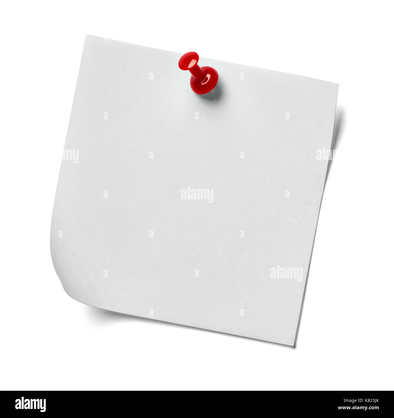 close up of a note paper with a red push pin on white background Stock ...