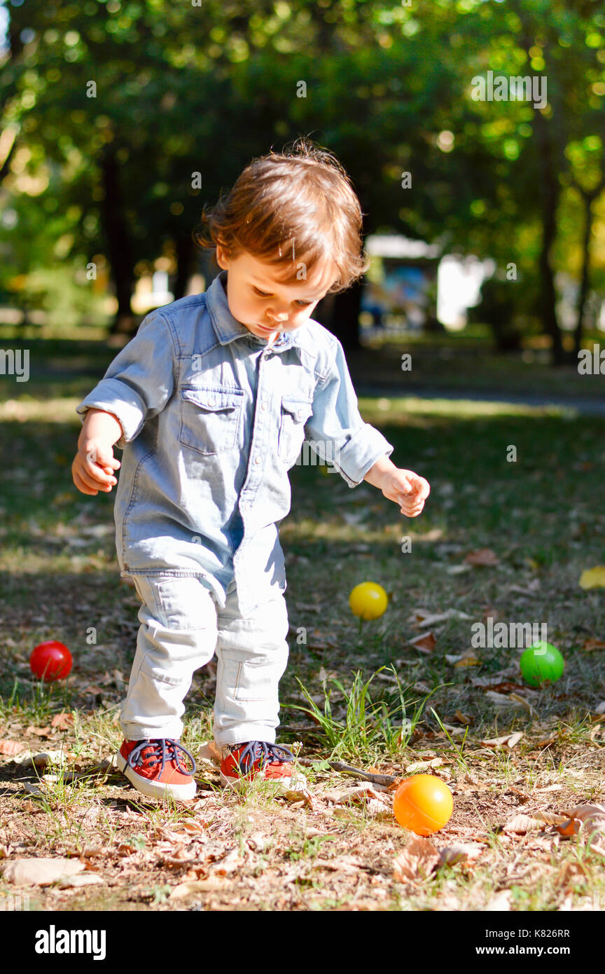 Young boy in the park hi-res stock photography and images - Alamy