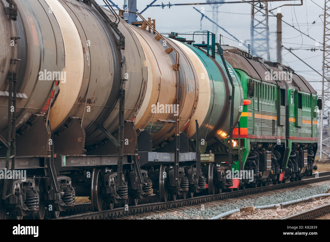Green diesel cargo locomotive. Freight train in action Stock Photo - Alamy