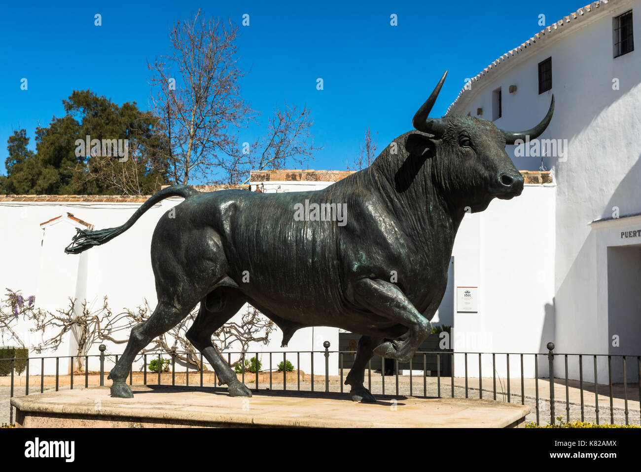 Ronda, Spain - March 7, 2017: Bull statue in front of the bullfighting ...
