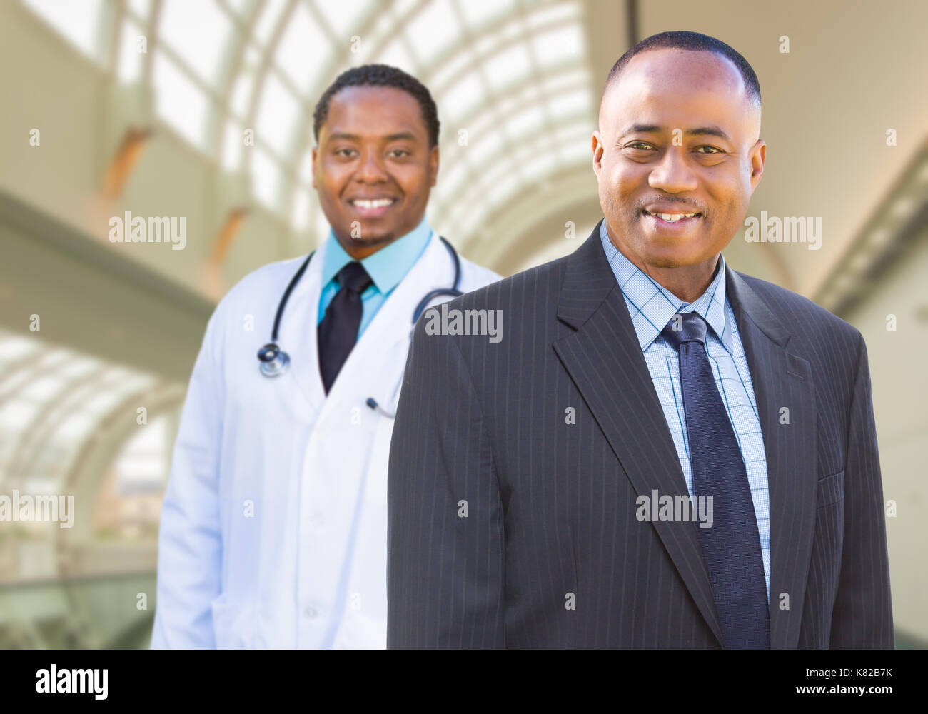 African American Businessman and Doctor Inside Medical Building Stock ...
