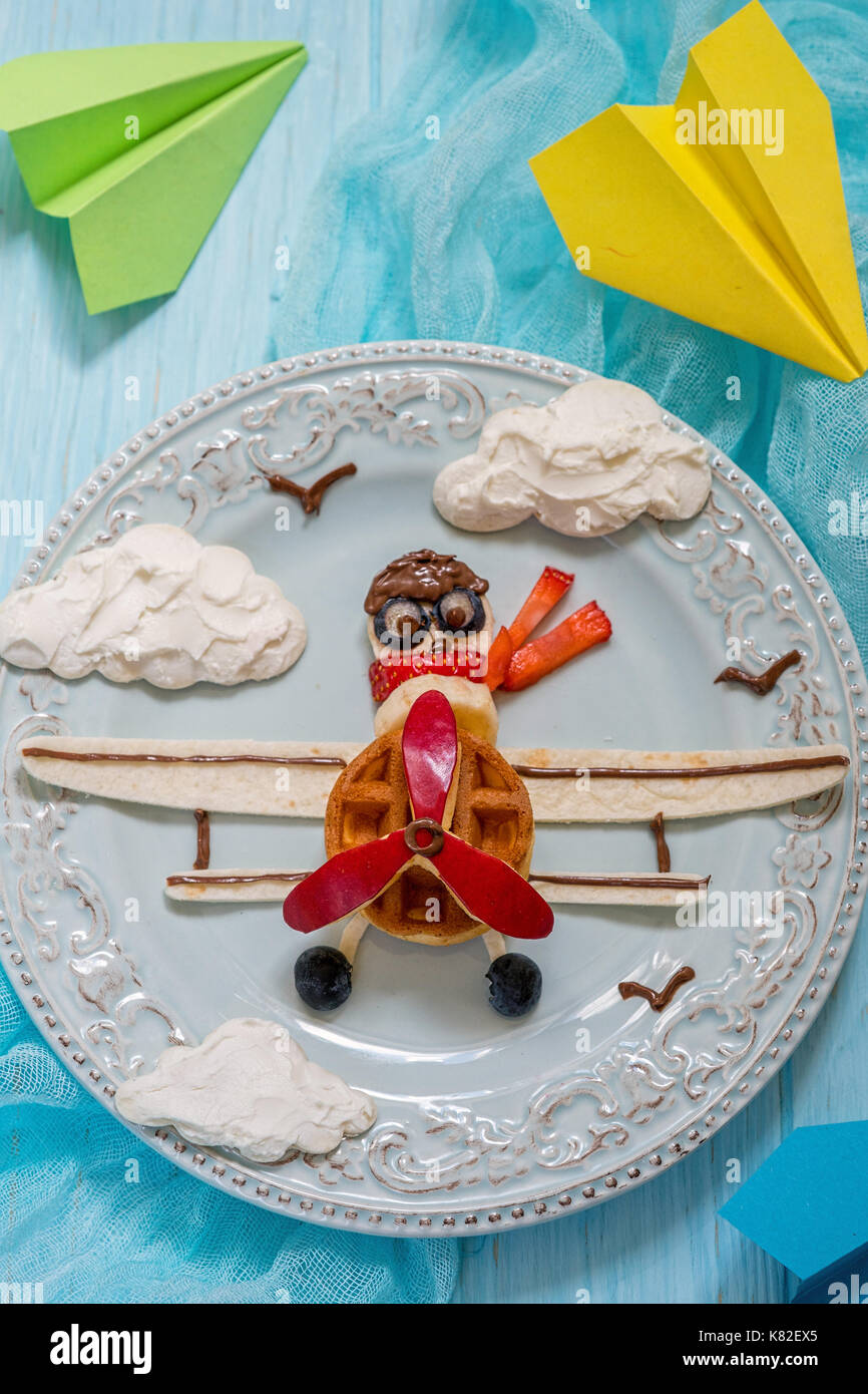 Funny Airplane breakfast with fruits for boy kids Stock Photo - Alamy
