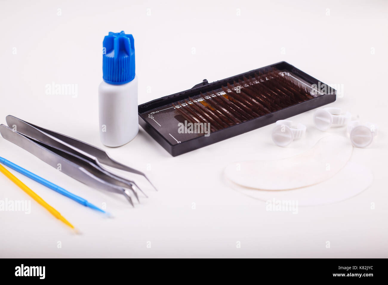 Eyelash Extension tools on white background. Accessories for eyelash ...