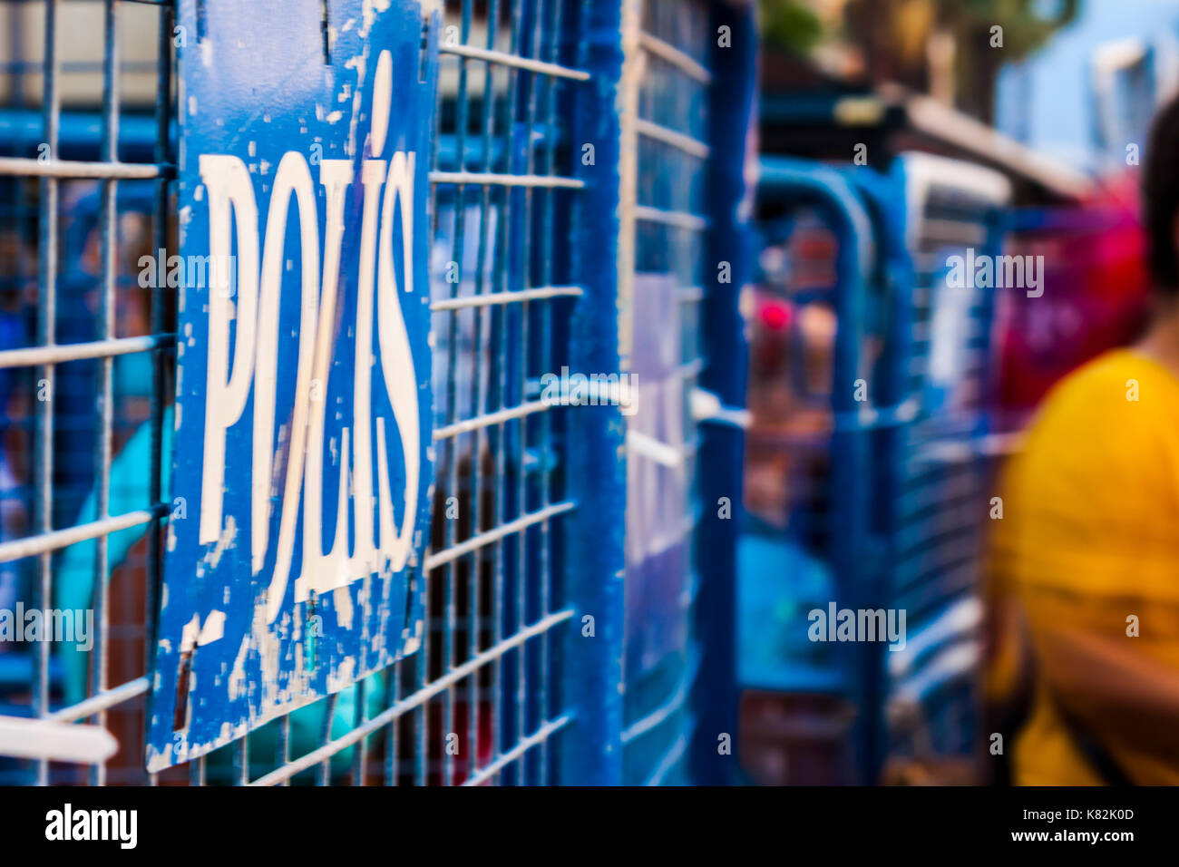 Metal grid as a security border for Police Stock Photo - Alamy