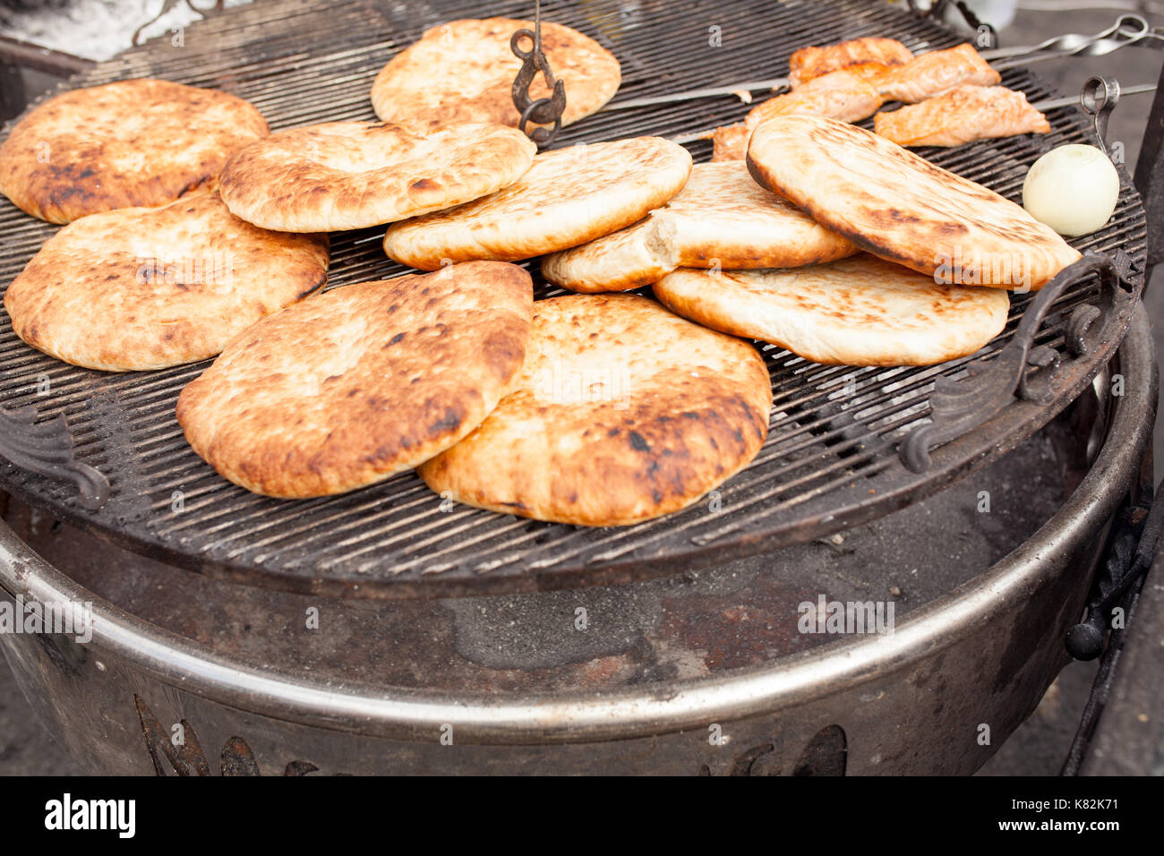 Pita, Arabic bread, soft baked flatbreads on grill Stock Photo - Alamy