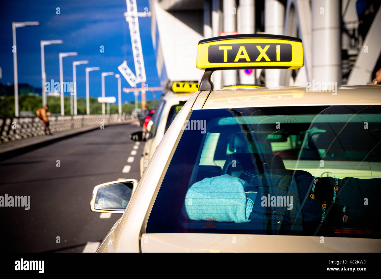 Taxi waiting for a ride Stock Photo - Alamy