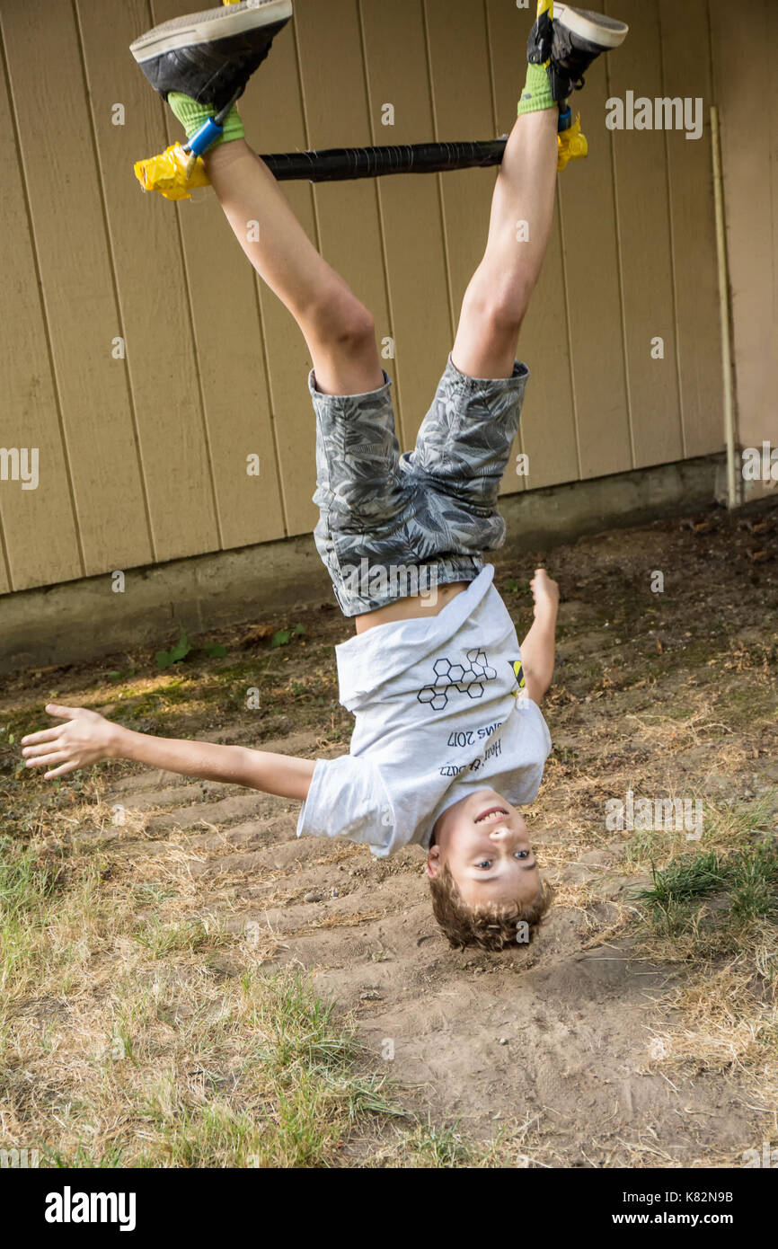 Kids hanging upside down High Resolution Stock Photography and Images - Alamy
