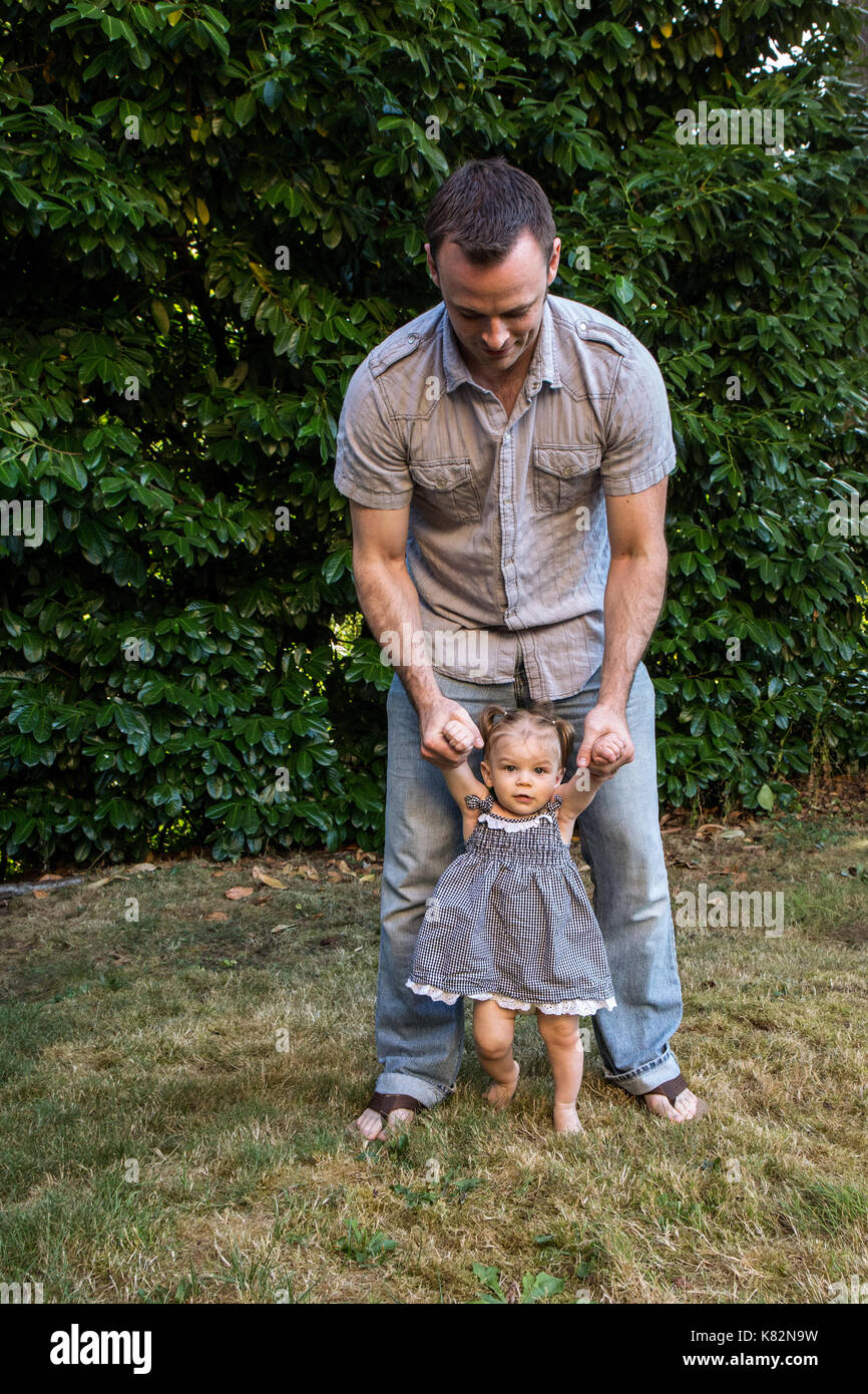 Helping her father hi-res stock photography and images - Alamy