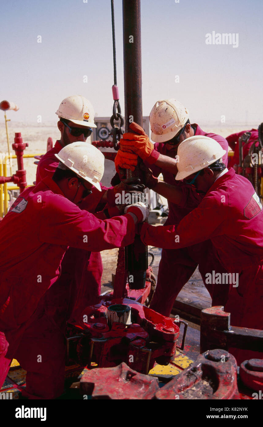 Drilling for oil in the Saudi desert near Abqaiq, by the Arabian ...