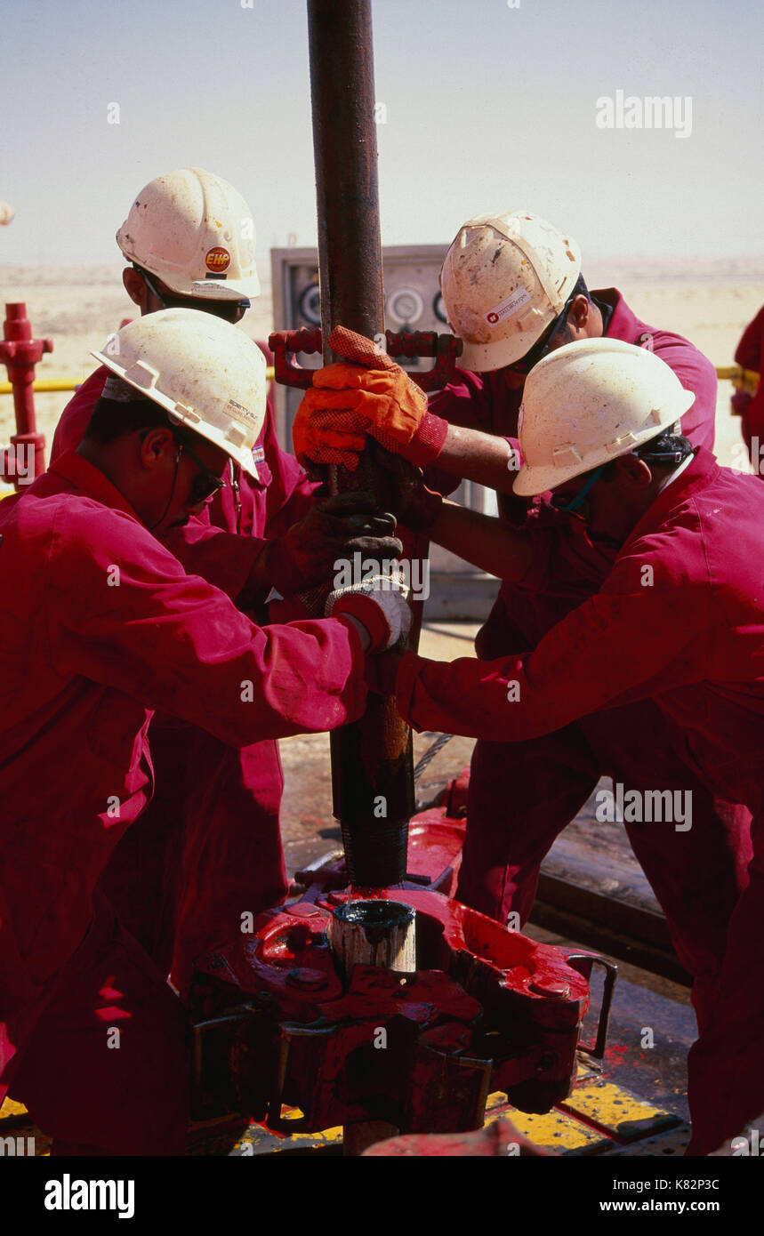 Drilling for oil in the Saudi desert near Abqaiq, by the Arabian ...
