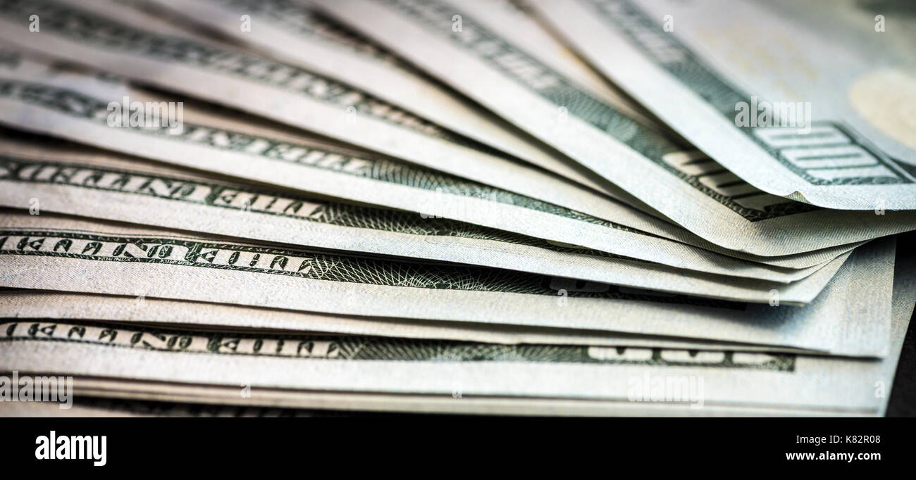 A pile of American dollars close-up Stock Photo - Alamy