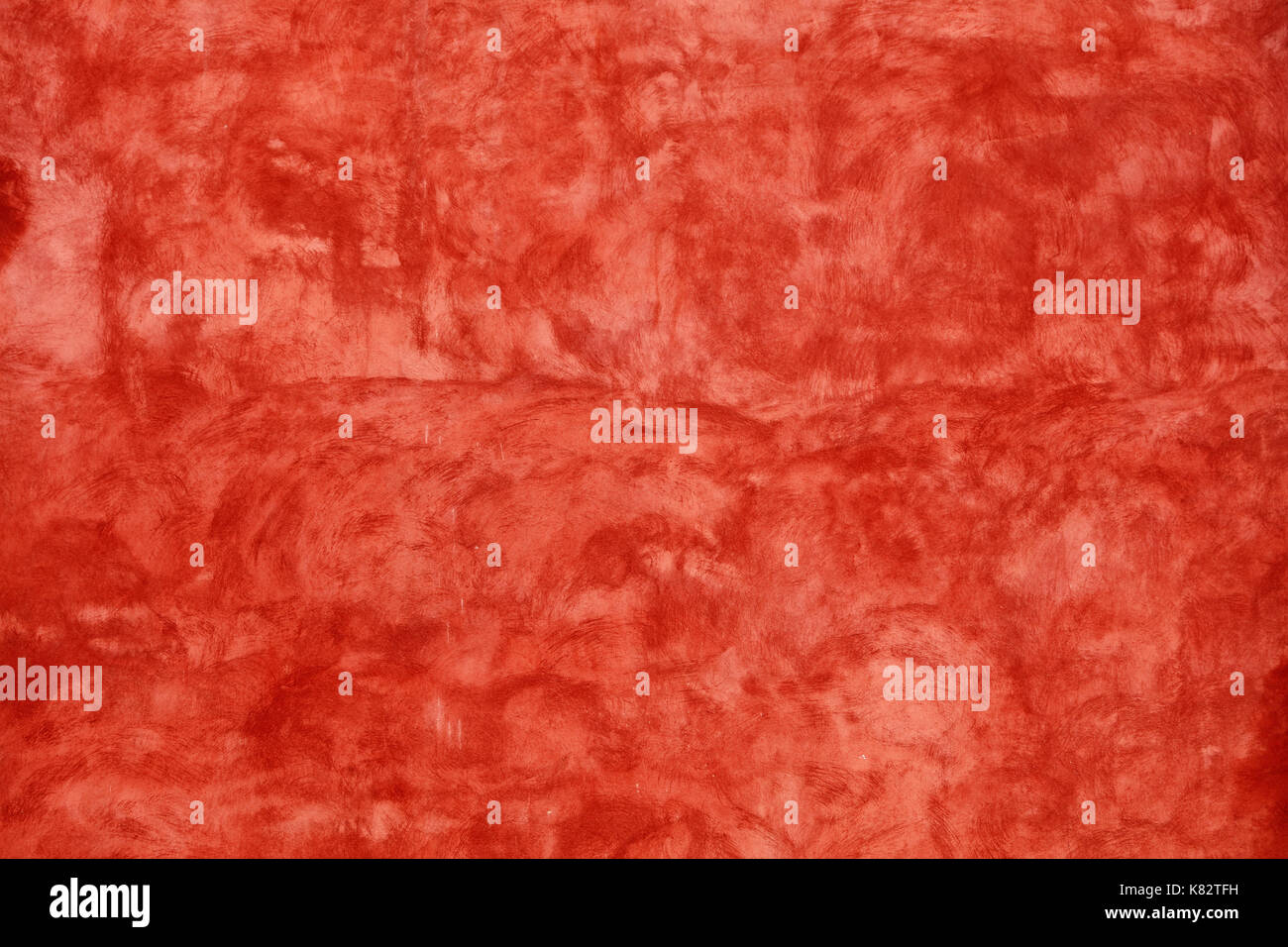 Grunge scarlet red vivid uneven old aged daub plaster wall texture ...