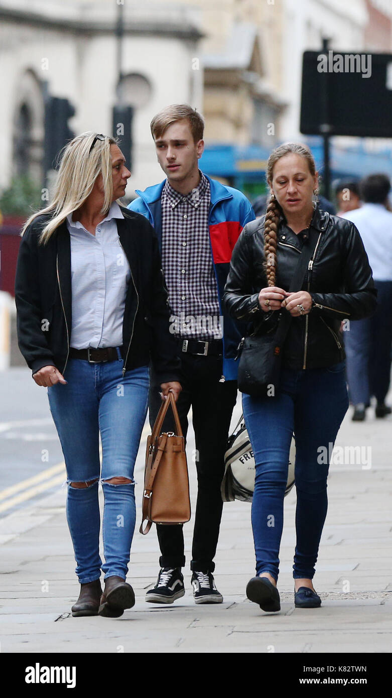 Charlie Alliston, 20 (centre), arrives at the Old Bailey in London ...