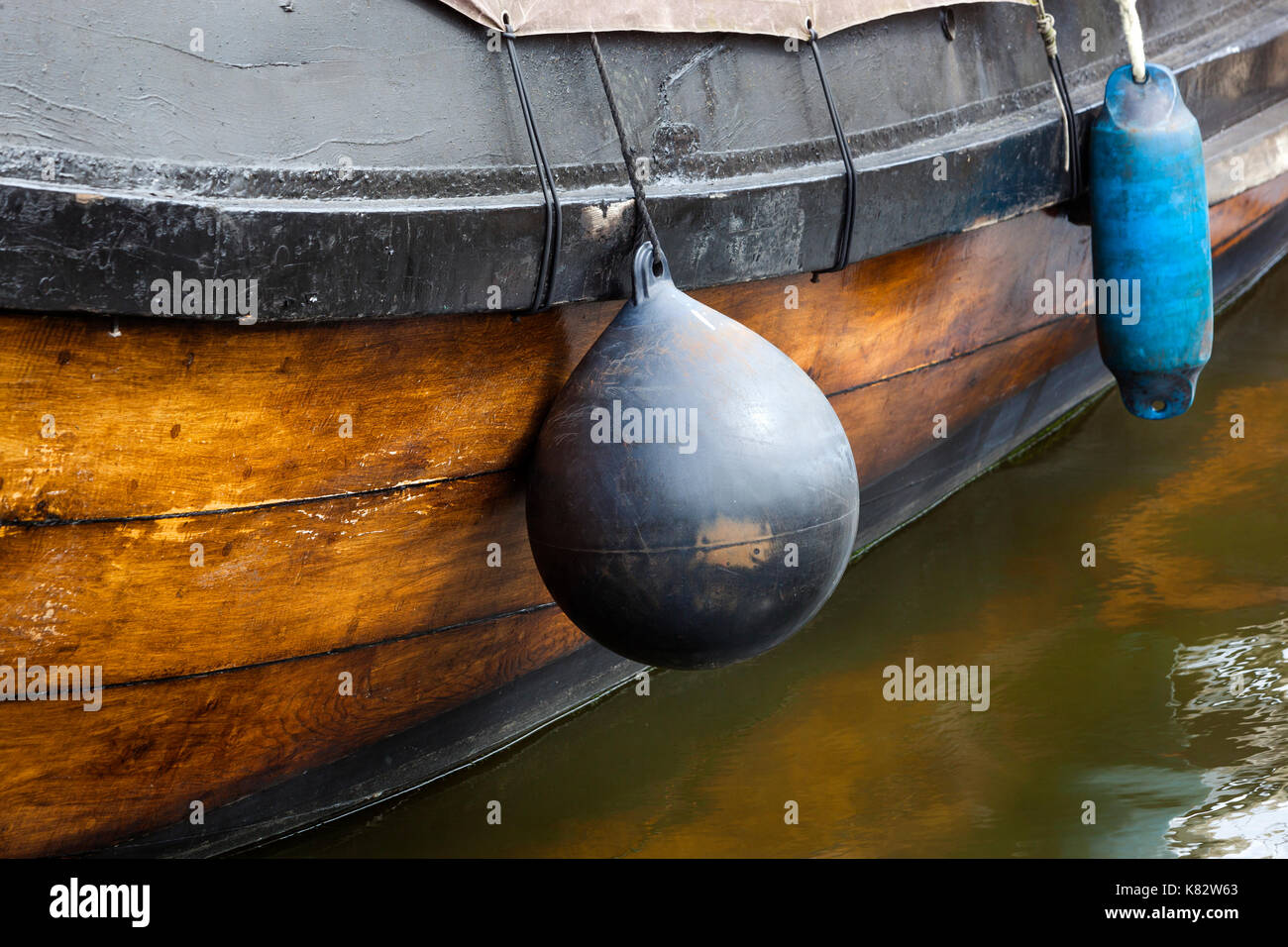 Fenders on a traditional wooden ship in the Netherlands Stock Photo - Alamy