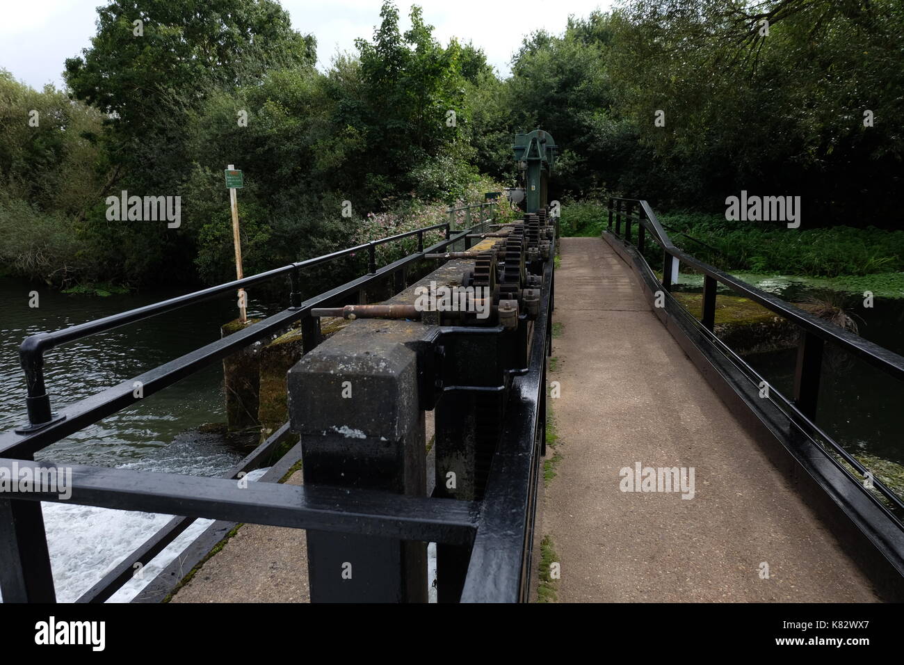 Weir water calming mechanism Stock Photo - Alamy