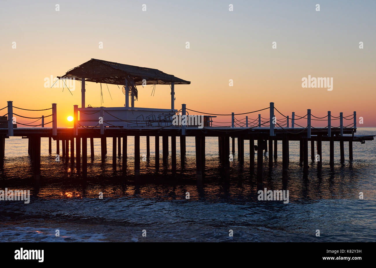 Wooden bridge pier against a beautiful sky measure used for natural ...