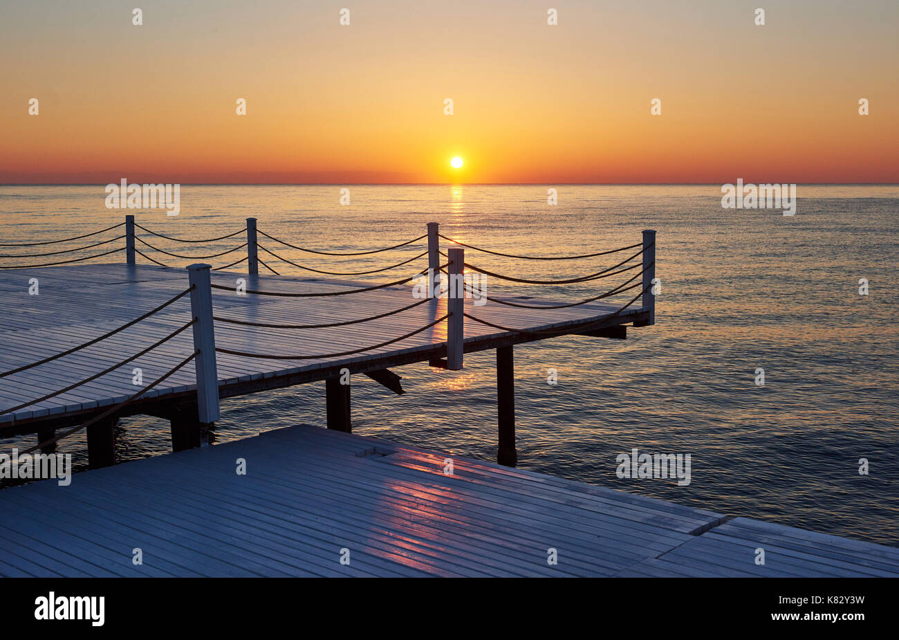 Wooden bridge pier against a beautiful sky measure used for natural ...