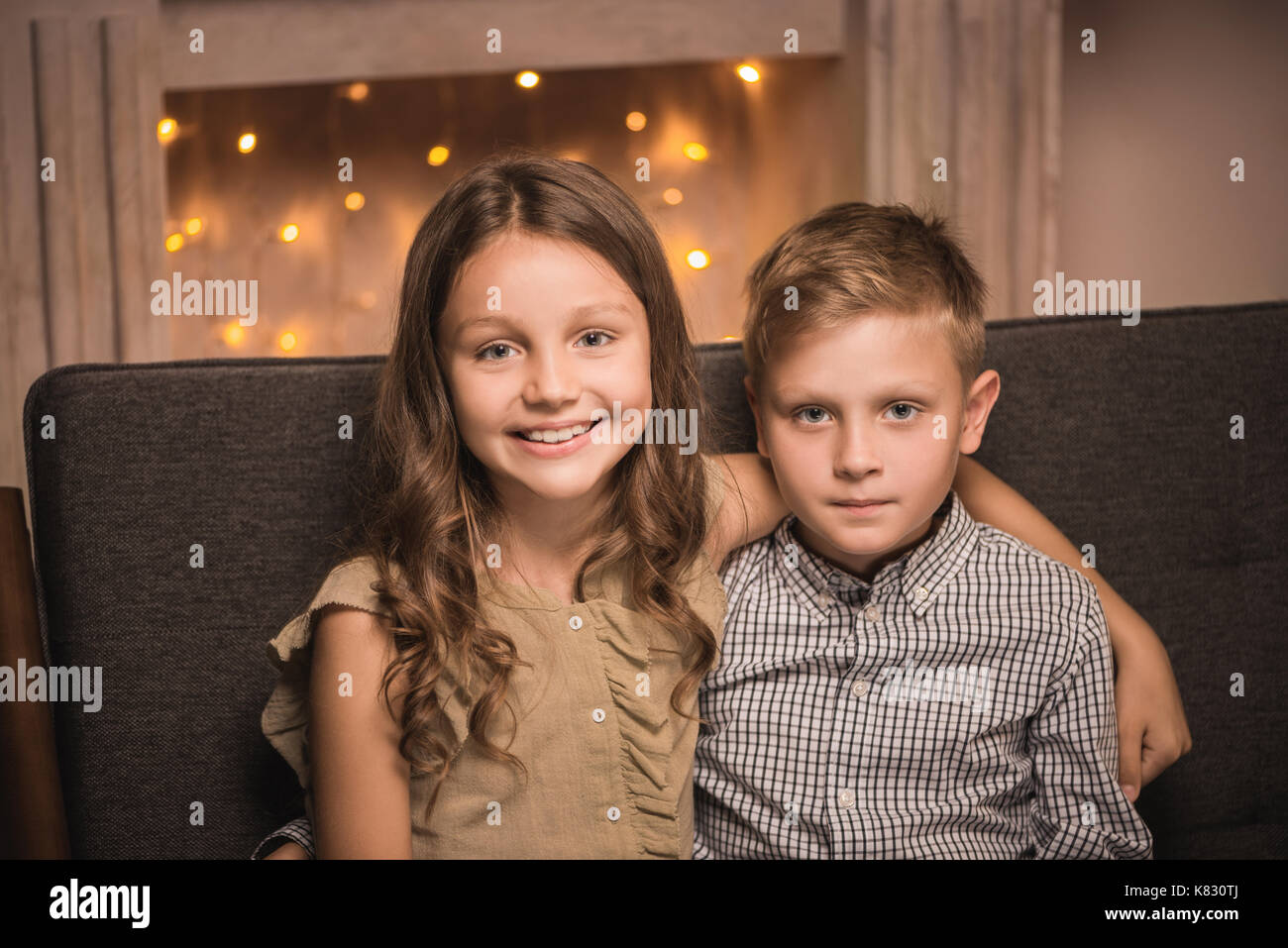 Smiling siblings hi-res stock photography and images - Alamy