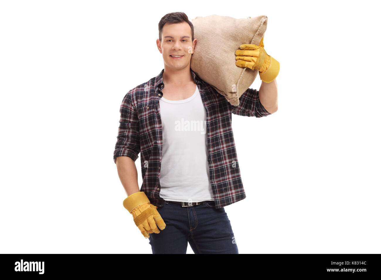 Worker carrying sack hi-res stock photography and images - Alamy