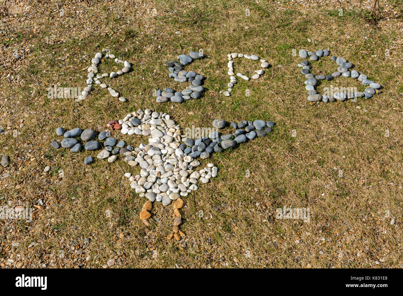 RSPB Sign in Pebbles Stock Photo - Alamy