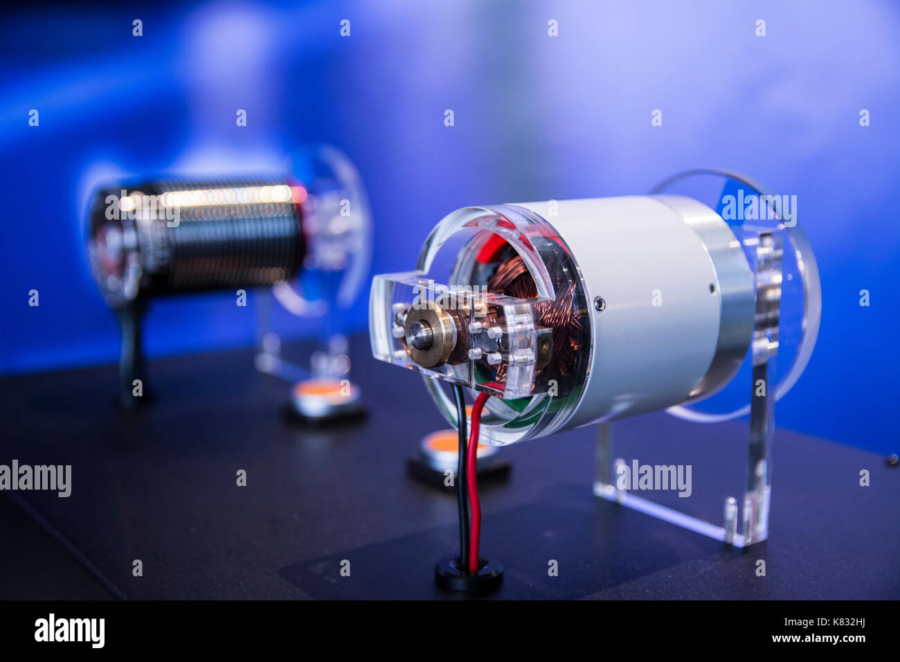 Two Bosch driller engines over a blue blur background Stock Photo - Alamy