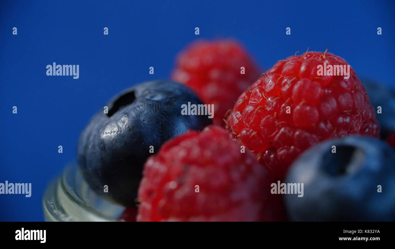 Fresh fruits - blueberry, raspberry. beautifully lined with raspberries ...