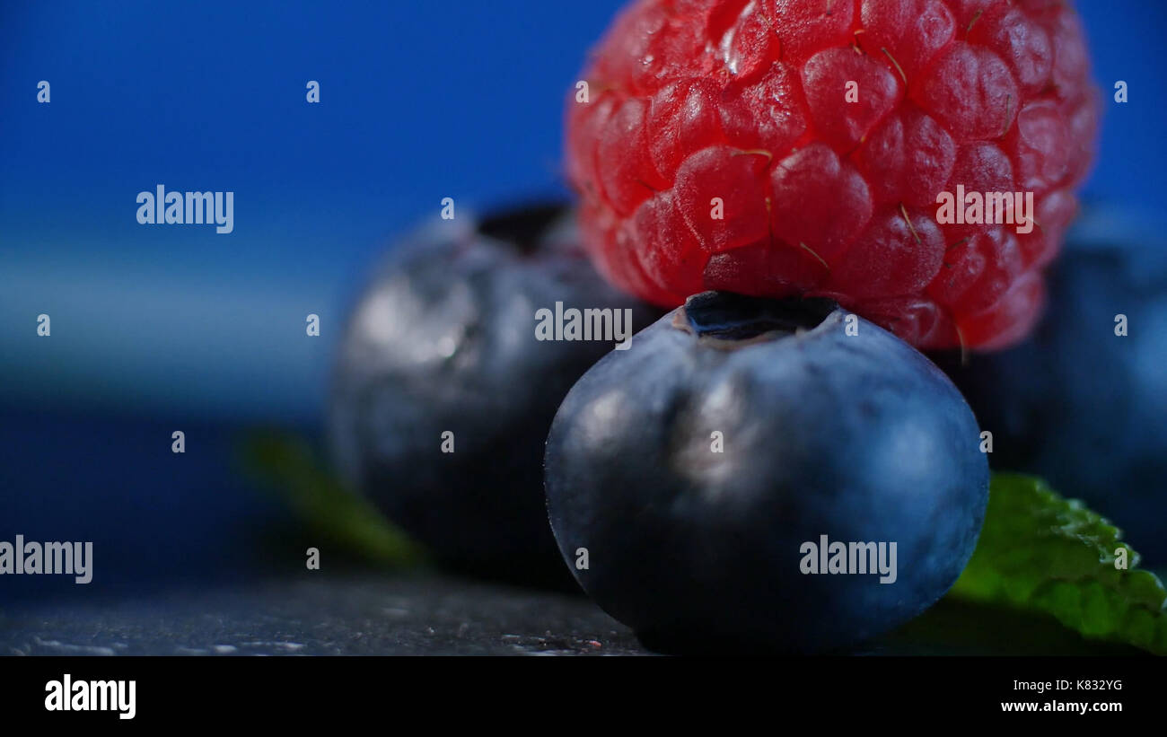 Fresh fruits - blueberry, raspberry. beautifully lined with raspberries ...