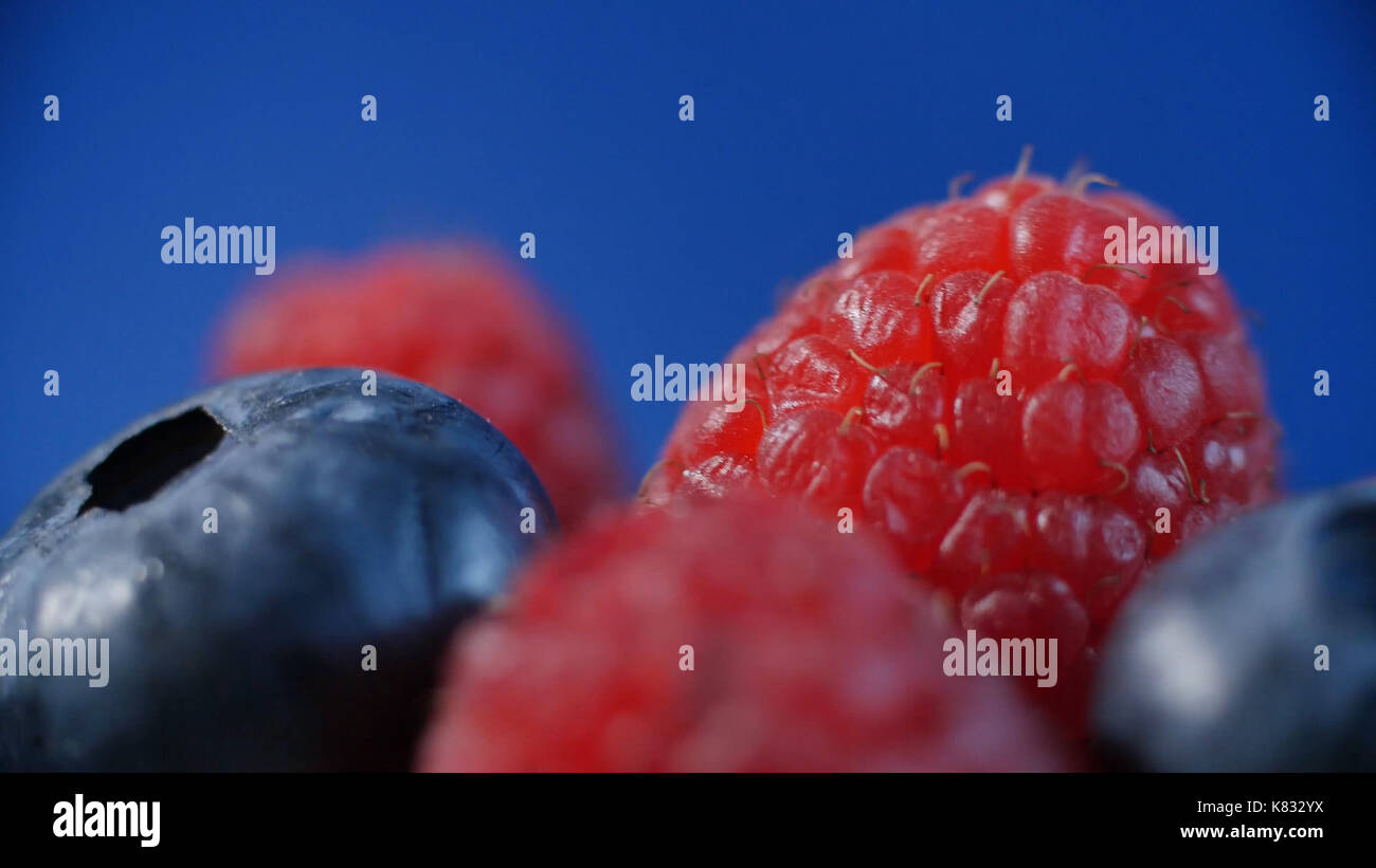 Fresh fruits - blueberry, raspberry. beautifully lined with raspberries ...