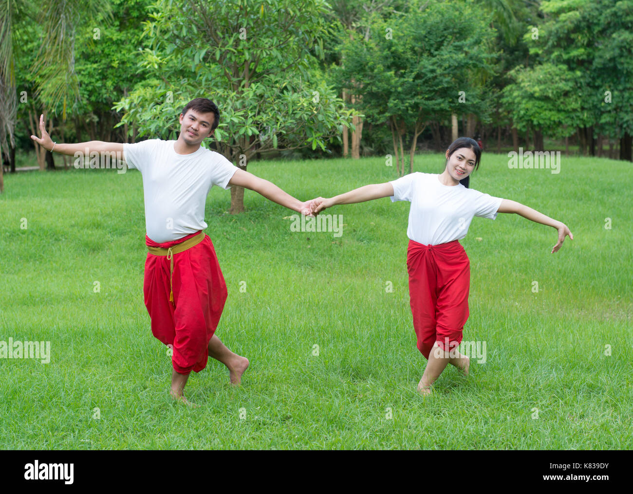 Asian young boy and girls learning Thai dance. Classical Dance in white ...