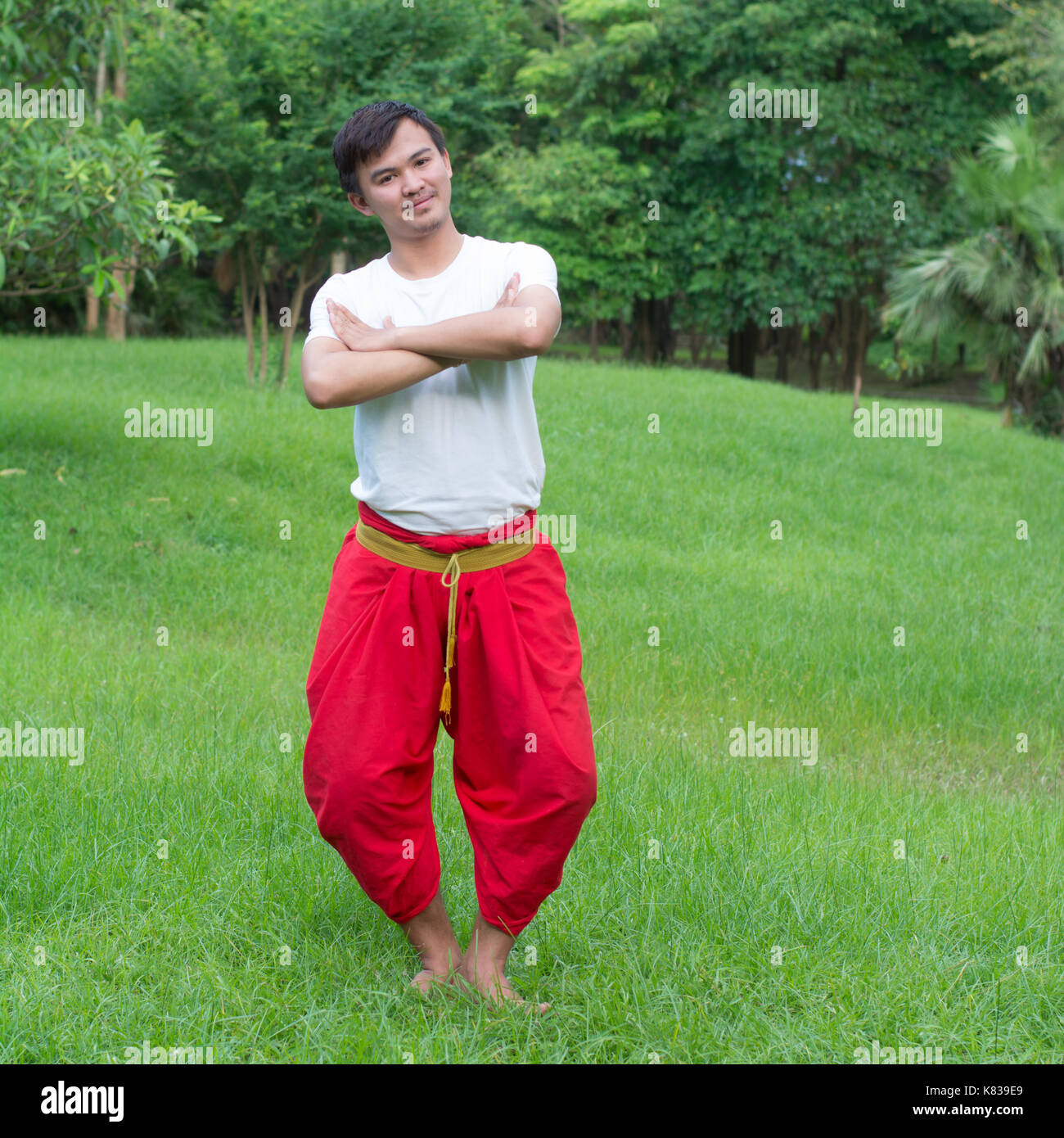 Asian young boy Thai dance. Classical Dance in white shirt red ...