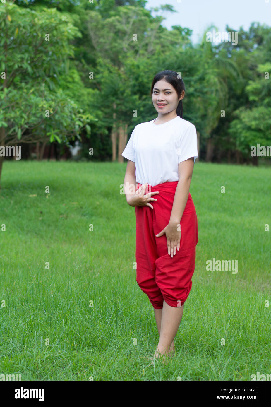 Asian young girl learning Thai dance. Classical Dance in white shirt ...