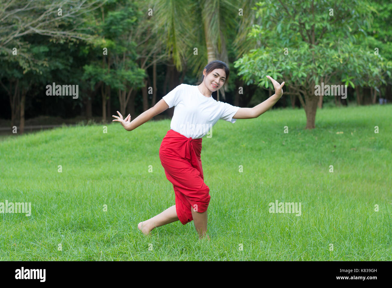 Asian young girl learning Thai dance. Classical Dance in white shirt ...