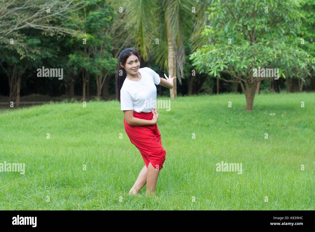 Asian young girl learning Thai dance. Classical Dance in white shirt ...